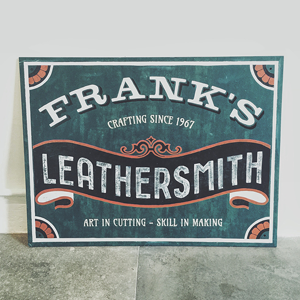 Frank’s Leathersmith – Aged / Storefront Signage – OLD WORLD CHARM